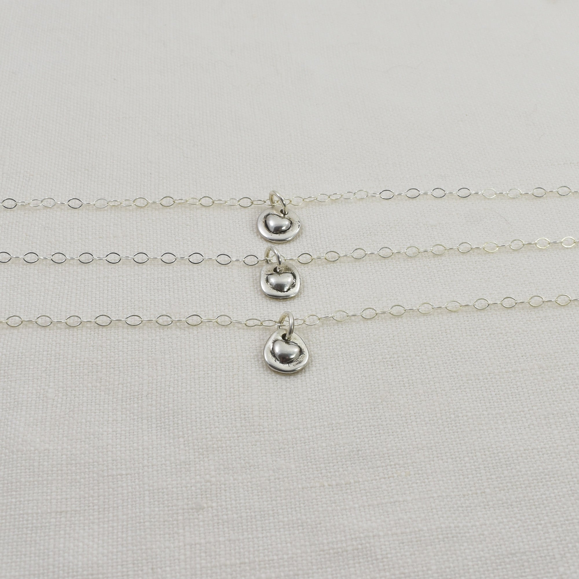 Playful Hearts - Tiny Heart Charm Bracelet | Sterling Silver – A ...