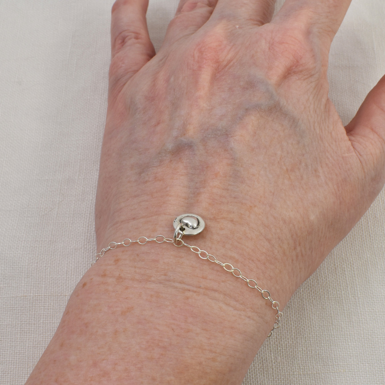Playful Hearts - Tiny Heart Charm Bracelet | Sterling Silver – A ...