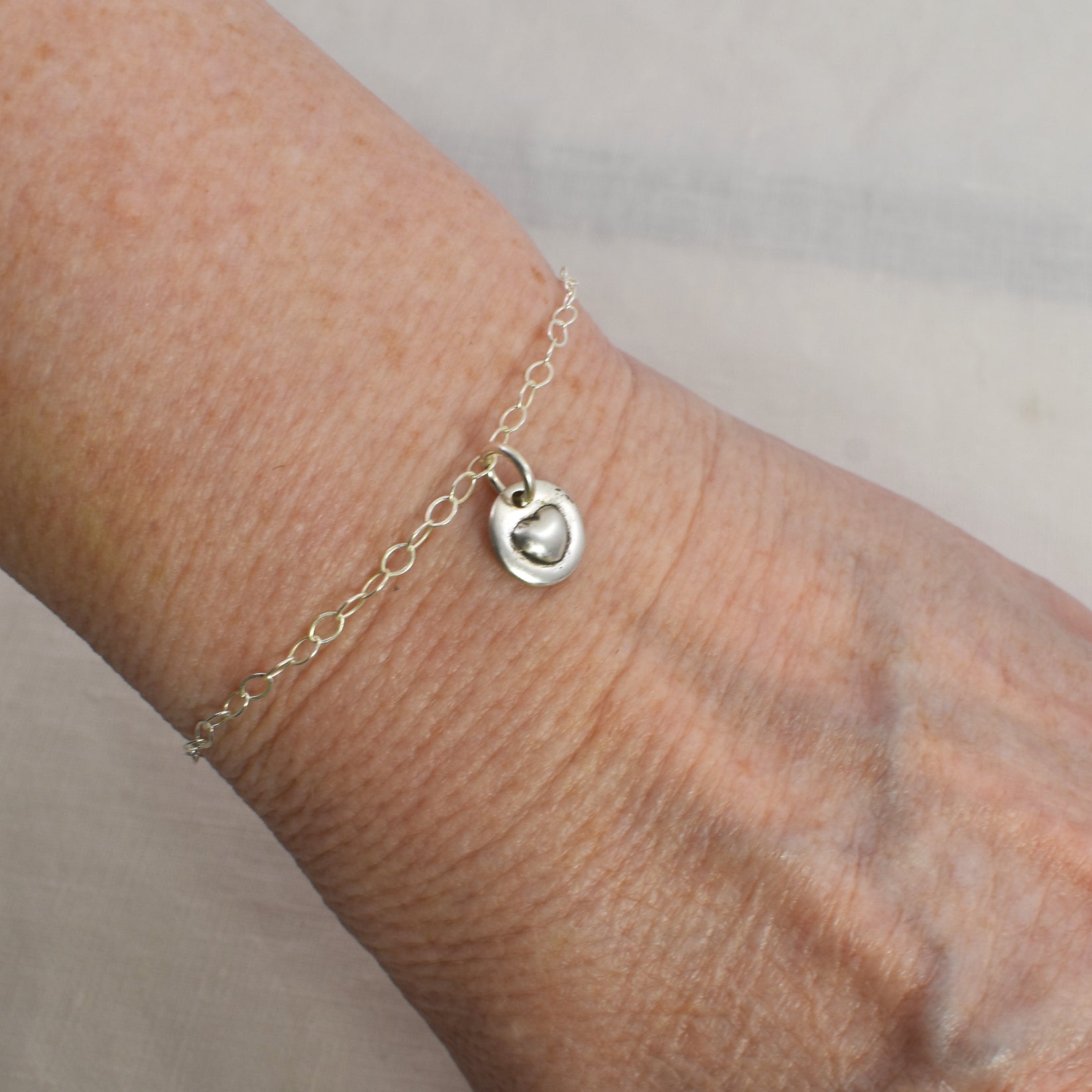 Playful Hearts - Tiny Heart Charm Bracelet | Sterling Silver – A ...